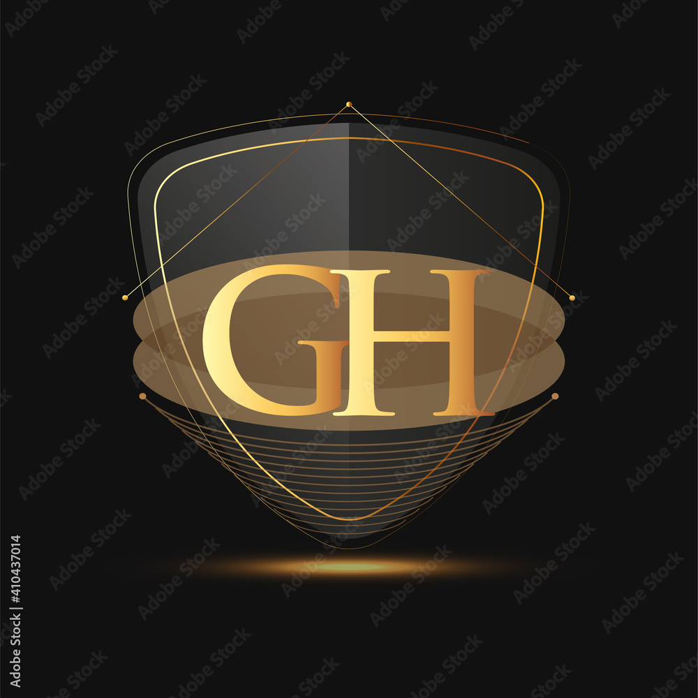 Initial logo letter GH with shield Icon golden color isolated on dark ...