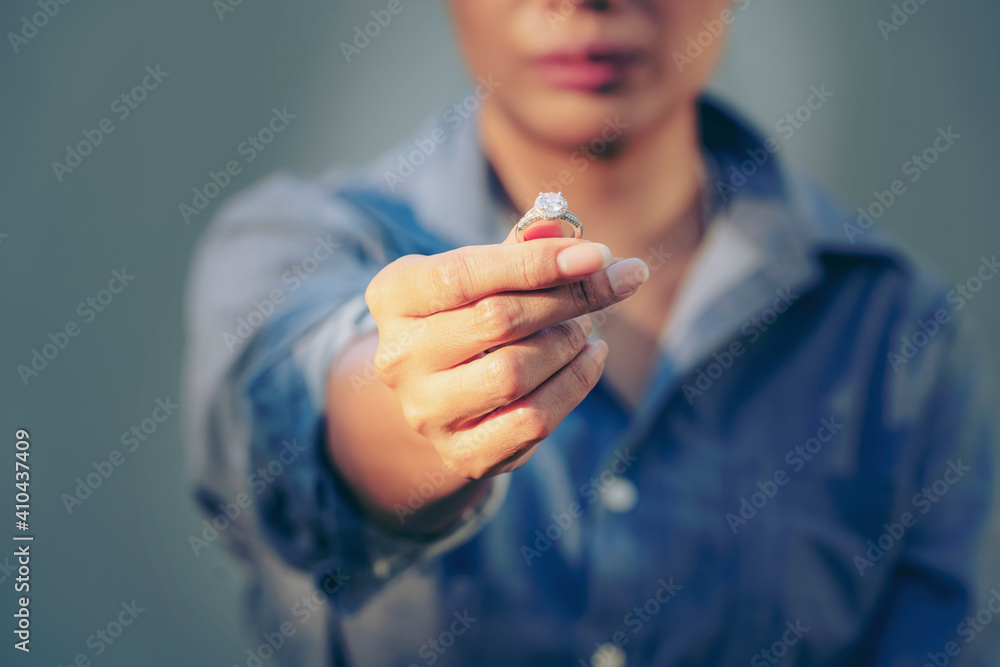 Sad Wife Take off the diamond wedding ring from finger. Quarrel fight ...