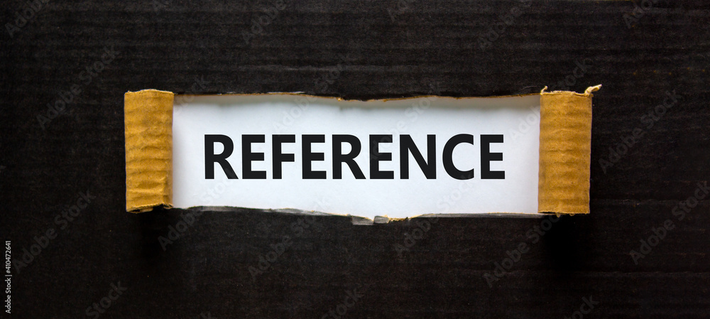 Reference symbol. The word 'reference' appearing behind torn black ...
