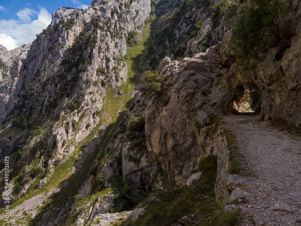 Tunnel pathway in Cares River canyon in Asturias. The Cares Route ...
