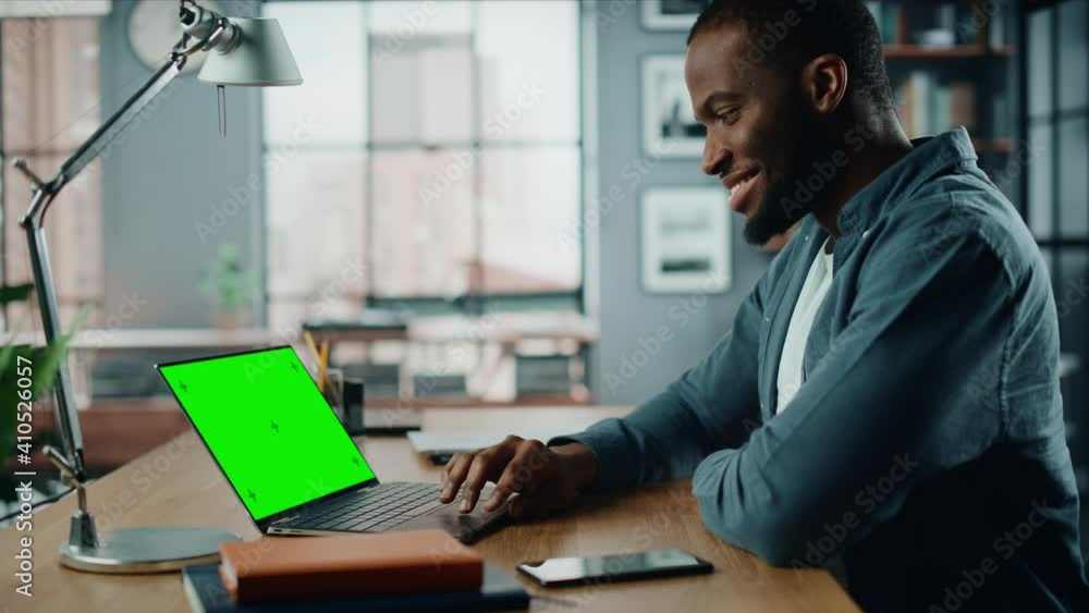 Handsome Black African American Specialist Working on Laptop Computer ...