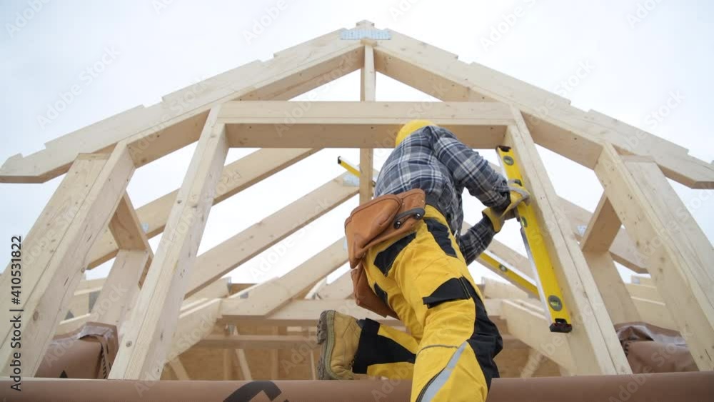 Construction Worker Making Sure Having All Beams Levels Correct. Using ...