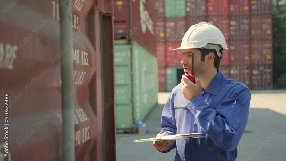 portrait Senior cargo manager hand hold radio control working process ...
