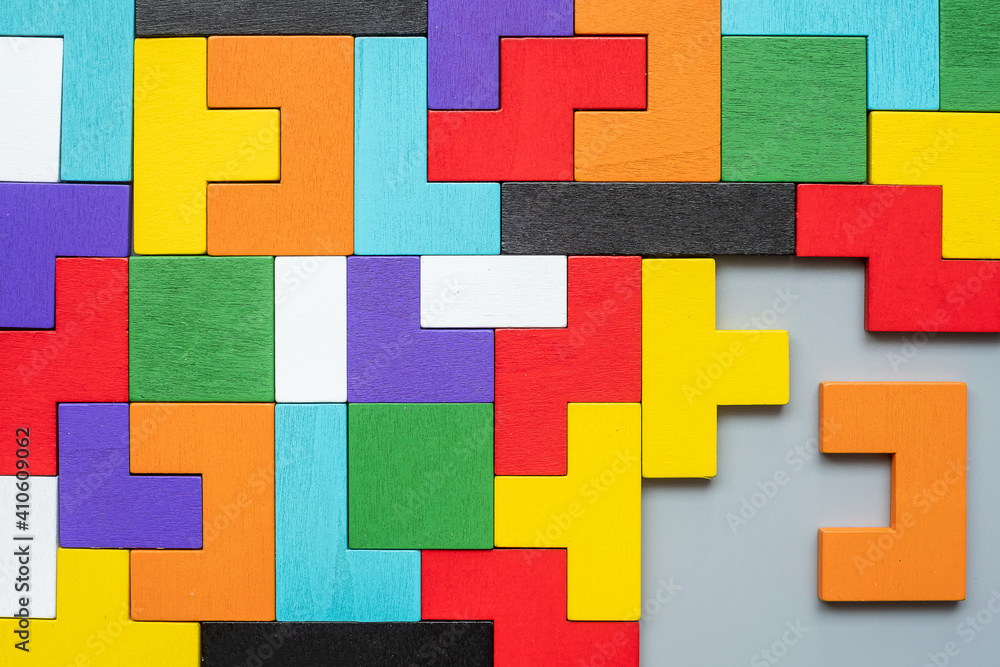 geometric shape block with colorful wood puzzle piece background ...