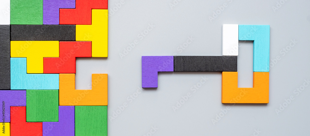 Key and keyhole shape of geometric colorful wood puzzle pieces. logical ...