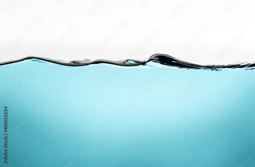 light blue water splash with bubbles of air, isolated on the white ...