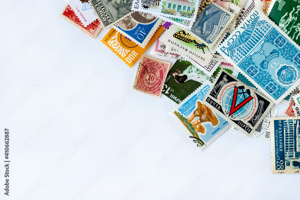 Corner border made of multicolored postage stamps collection from ...