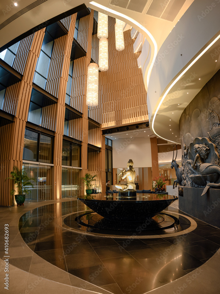 Interior of reception hall with design of wooden and light on entrance ...