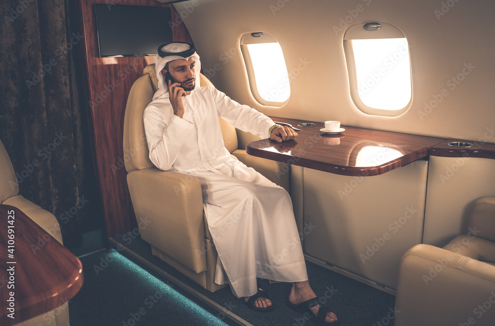 Business man from united arab emirates flying on his private jet to ...