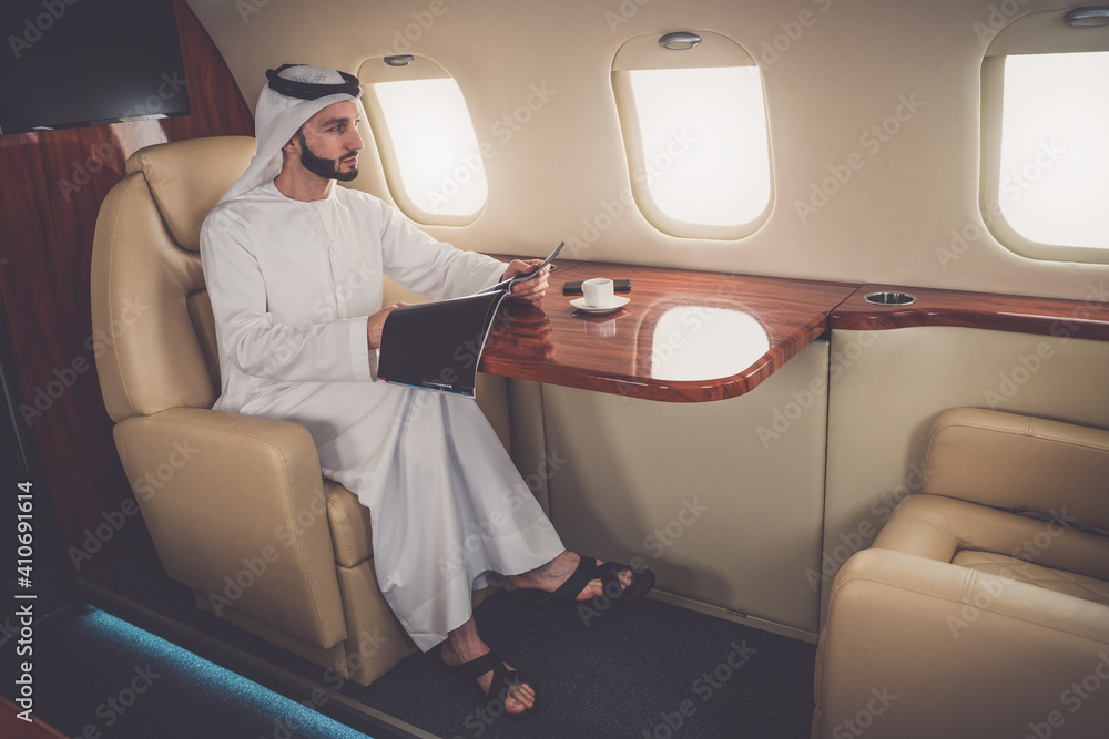 Business man from united arab emirates flying on his private jet to ...