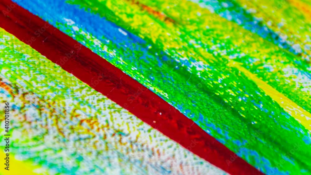 Background from different strokes of red, yellow, green and blue paint ...