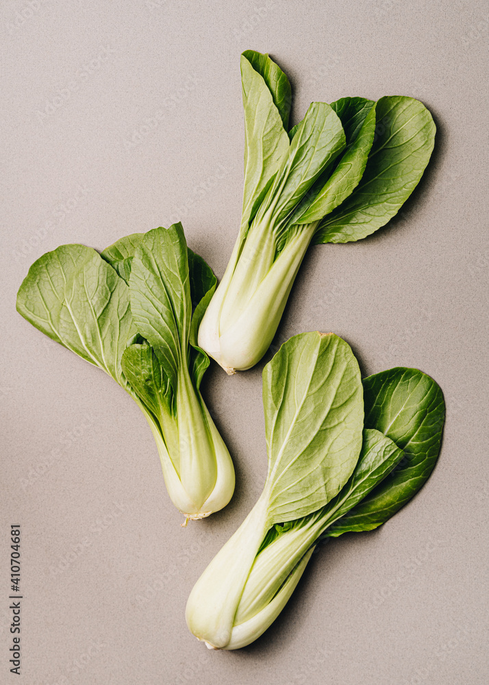 Pak Choi, pok choi, bok choy, fresh green Chinese cabbage on grey ...