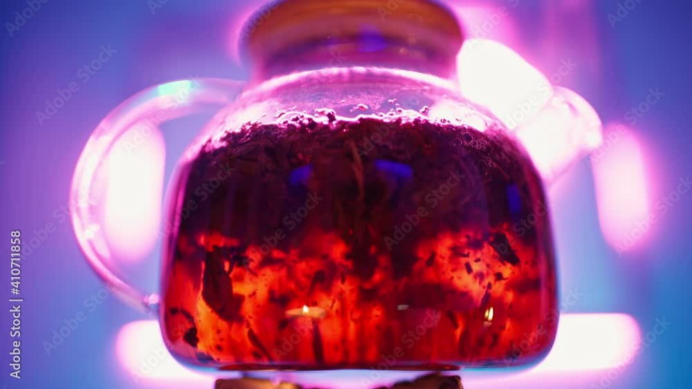 Transparent Teapot with Black Tea Leaves Boils on a Gas Burner against ...