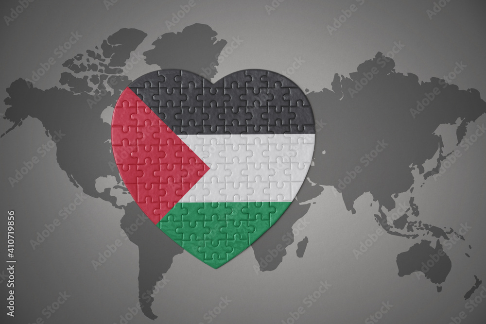 puzzle heart with the national flag of palestine on a world map ...