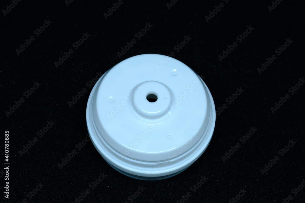 Medicine bottle cap on black background , From injection molding ...