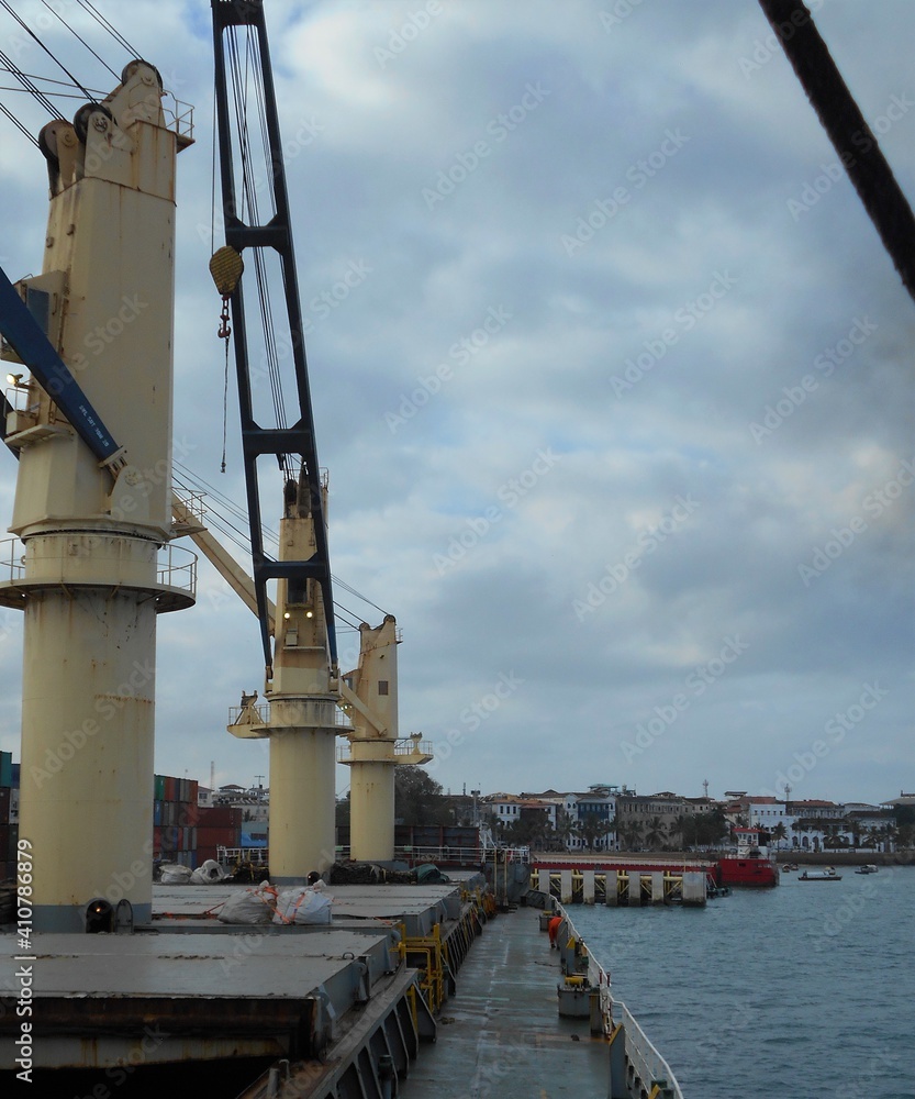 View of the deck cranes fitted onboard a merchant vessel, bulk carrier ...