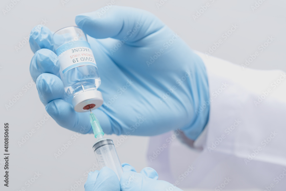 Vaccine injection,The doctor is preparing the vaccine and Syringe tube ...