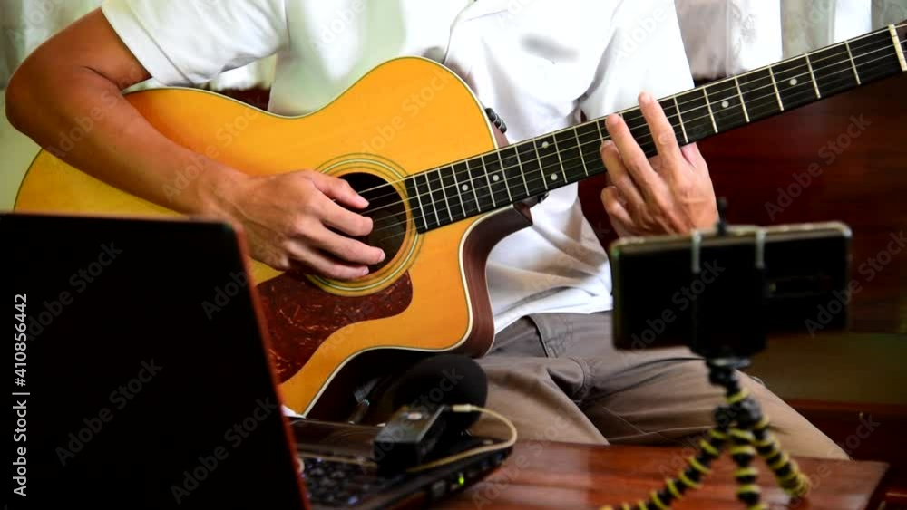 musician live streaming playing guitar show from home Stock ビデオ | Adobe ...