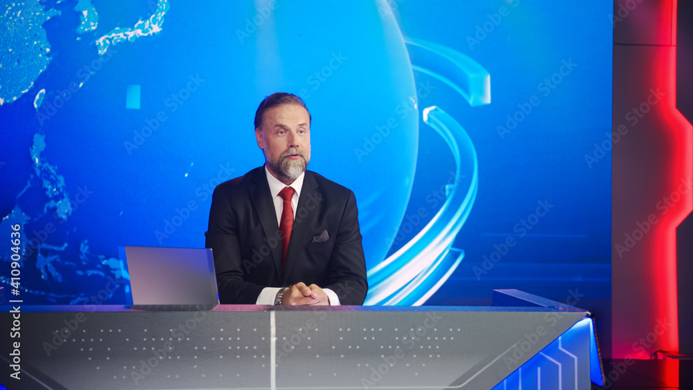 Live News Studio with Handsome Male Newscaster Reporting on the Events ...