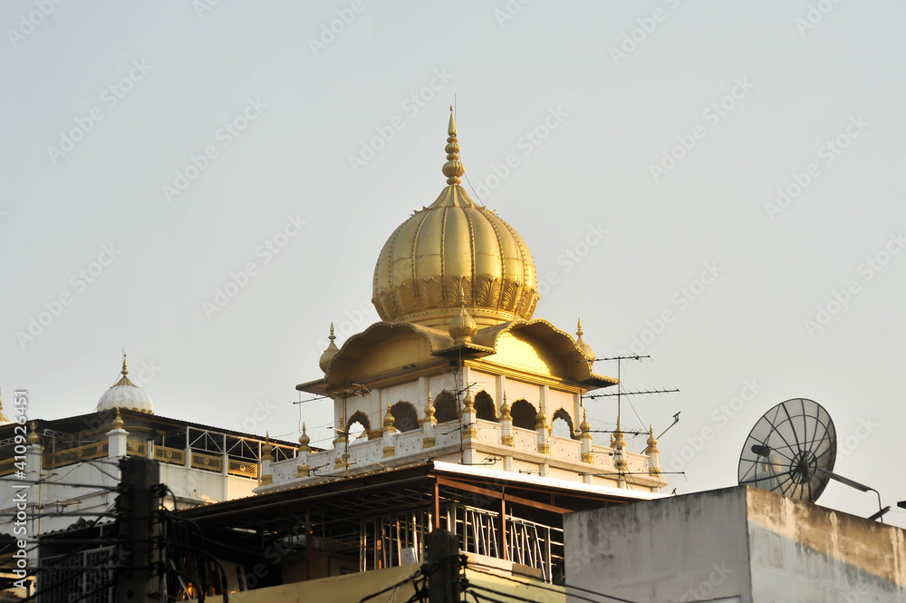 Landscape view of the golden dome of Gurudwara Sri Guru Singh Sabha ...