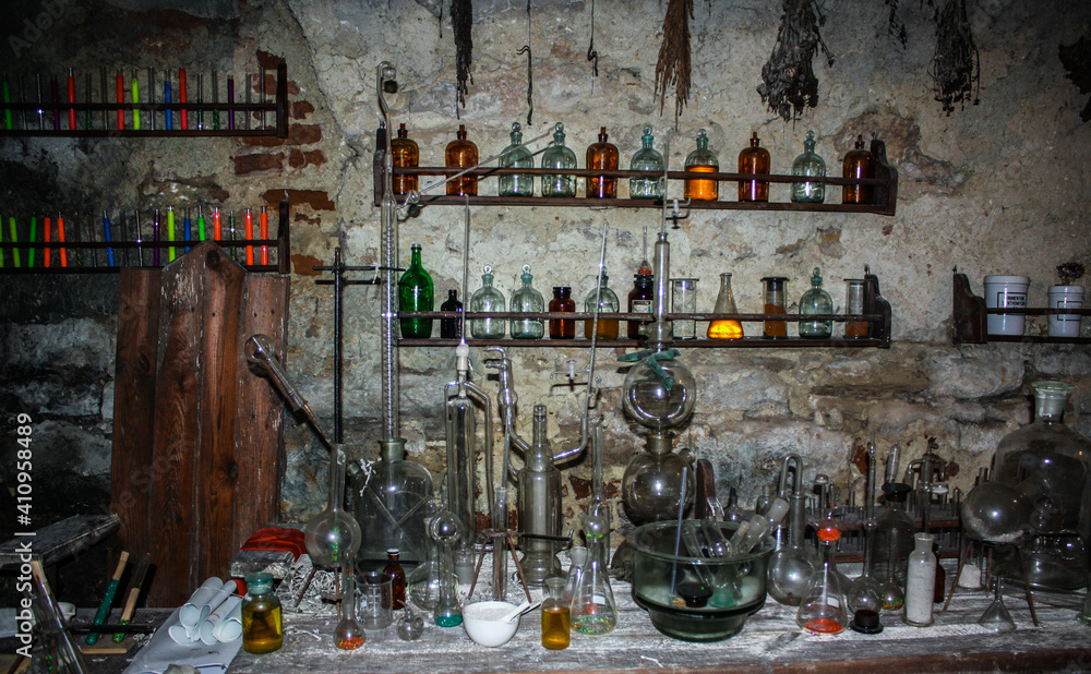 Old scary laboratory mining tools & measuring devices. Bottles in old ...