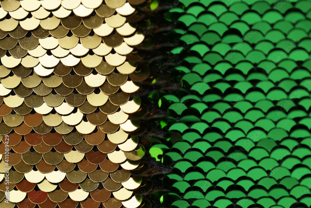 Sequins background Green and gold sequins half background. vibrant ...