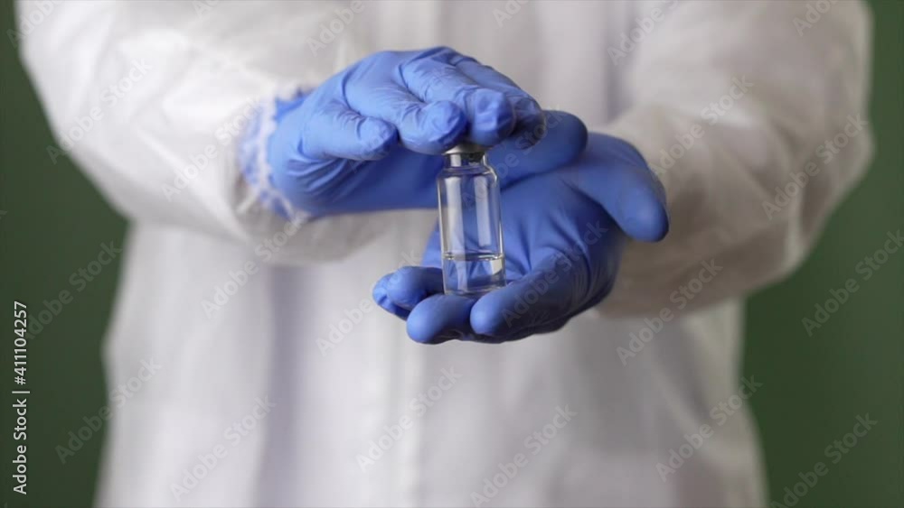 Moment of Science. Lab assistant in personal protective equipment or ...