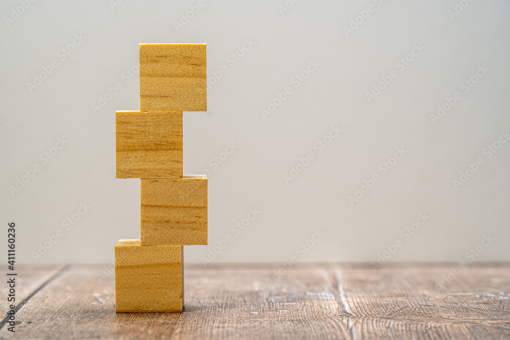 Four stacked Blank wooden square cube mock up with a simple background ...