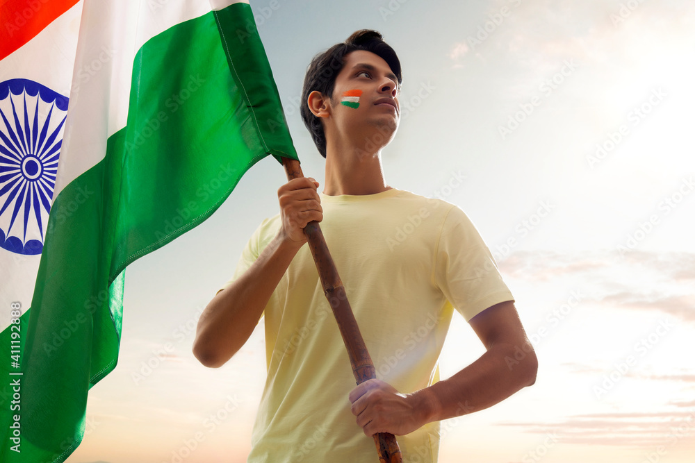 young man holding indian flag proudly, independence day Stock Photo ...