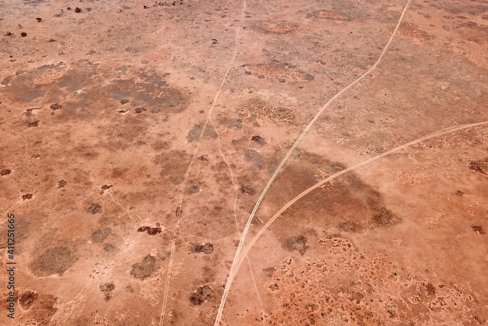 Dirt tracks across the Australian outback Stock Photo | Adobe Stock