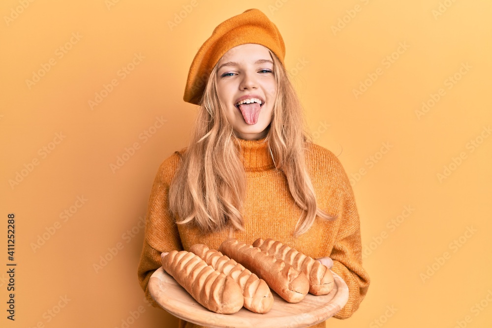Beautiful young caucasian girl wearing french look with beret holding ...