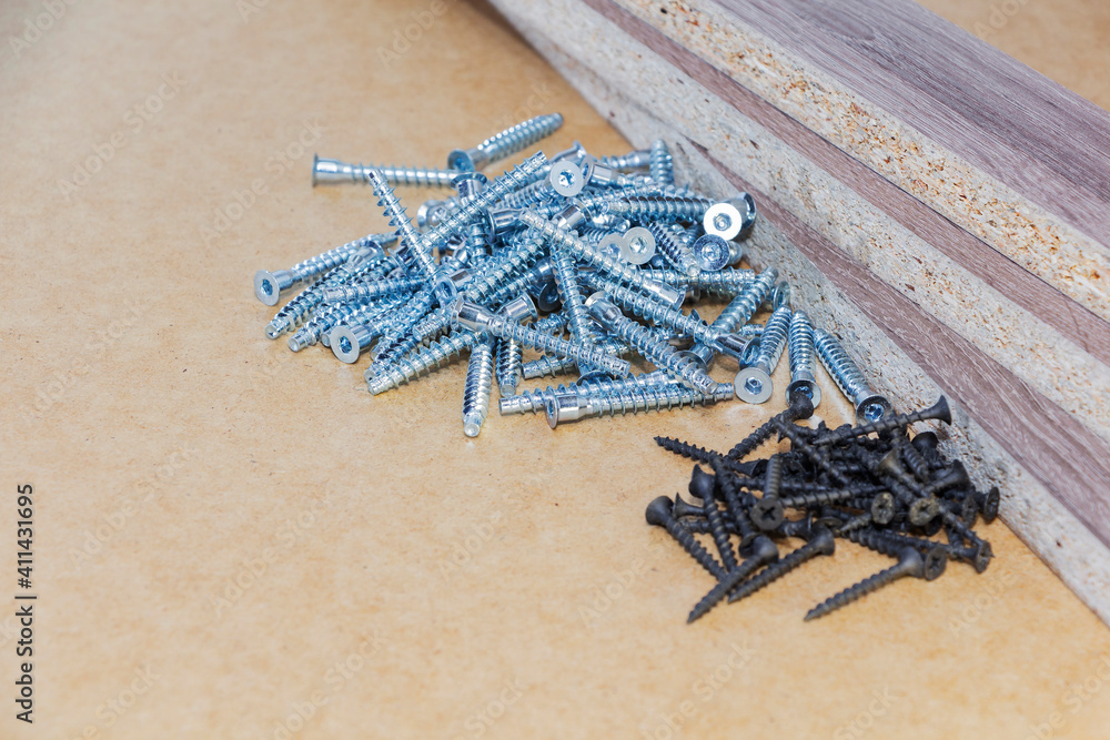 Screw-on for furniture. Metal screw. Vertical. Metal screws. Furniture ...