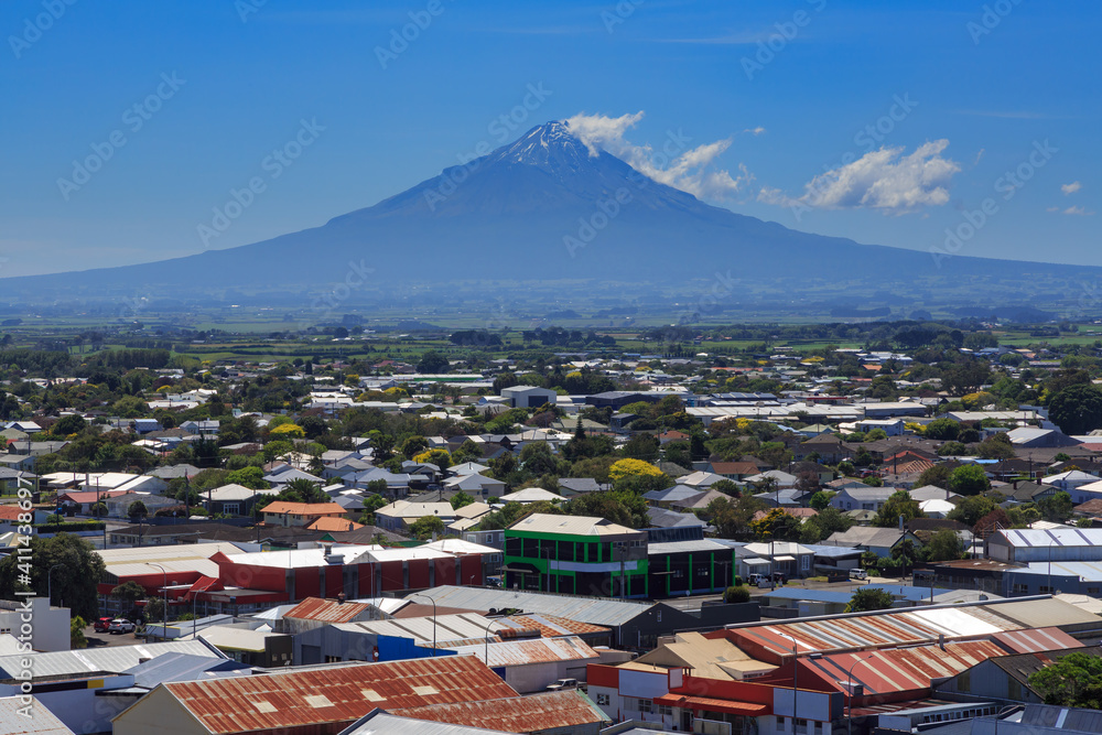 The town of Hawera, New Zealand, with Mount Taranaki in the background ...