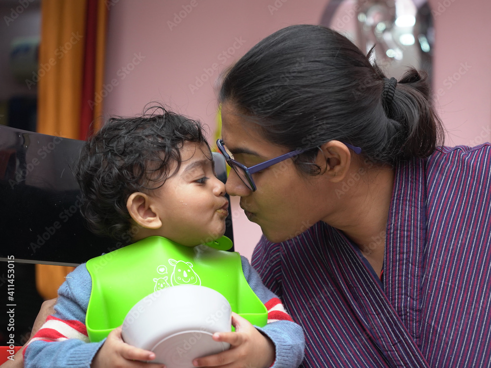 Mother bumping her nose to her baby's nose Stock Photo | Adobe Stock