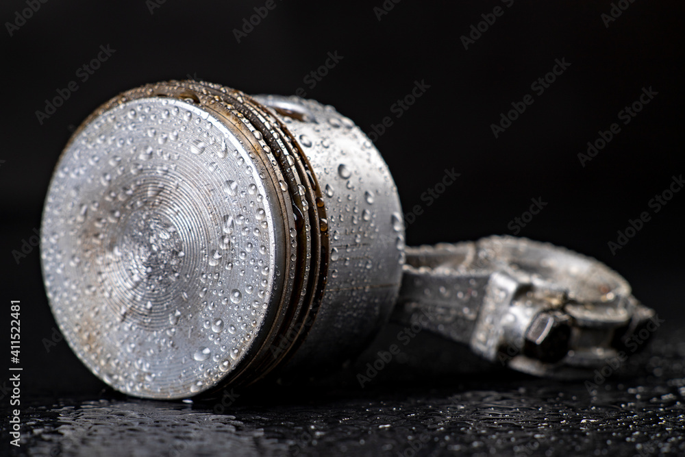 Water drops on the piston of the internal combustion engine. Wet spare ...