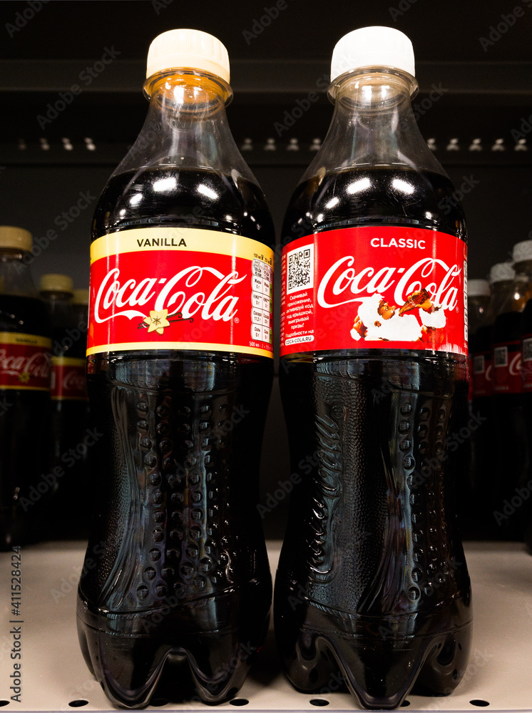 2021: Coca Cola in plastic bottles standing on supermarket shelf Stock ...