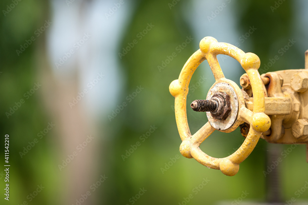 A manual mechanical valve of refinery plant processing pipeline with ...