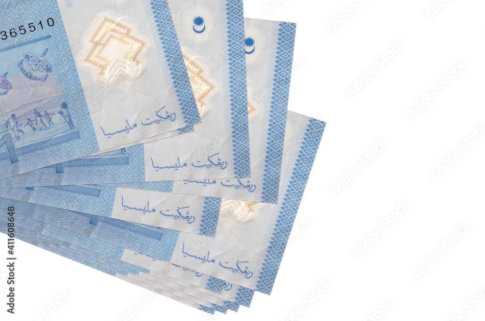 1 Malaysian ringgit bills lies in small bunch or pack isolated on white ...