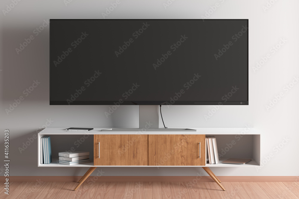 TV wide screen on the TV stand in modern living room with white wall ...
