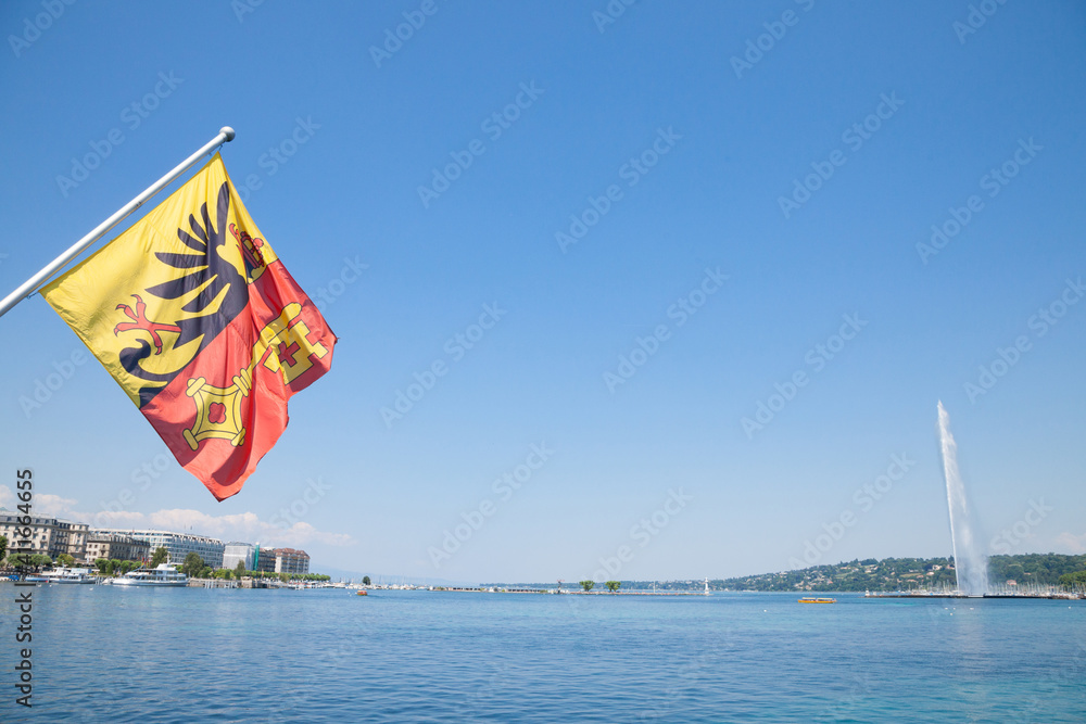 Flag of the Geneva Canton in the city center of Geneva, on the Leman ...