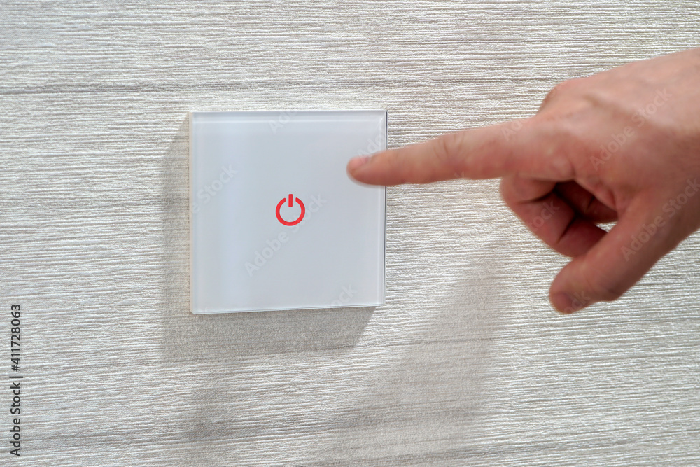 save energy concept,closeup of finger touching to electric switch. man ...