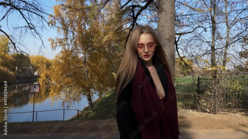 Chic long haired lady in candid revealing outfit flirts with the viewer ...