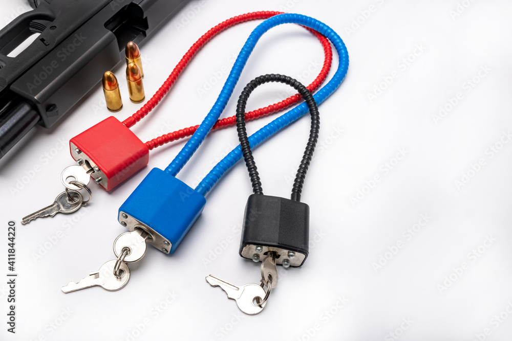 Weapon cable lock keys used to safely secure a firearm from being used ...