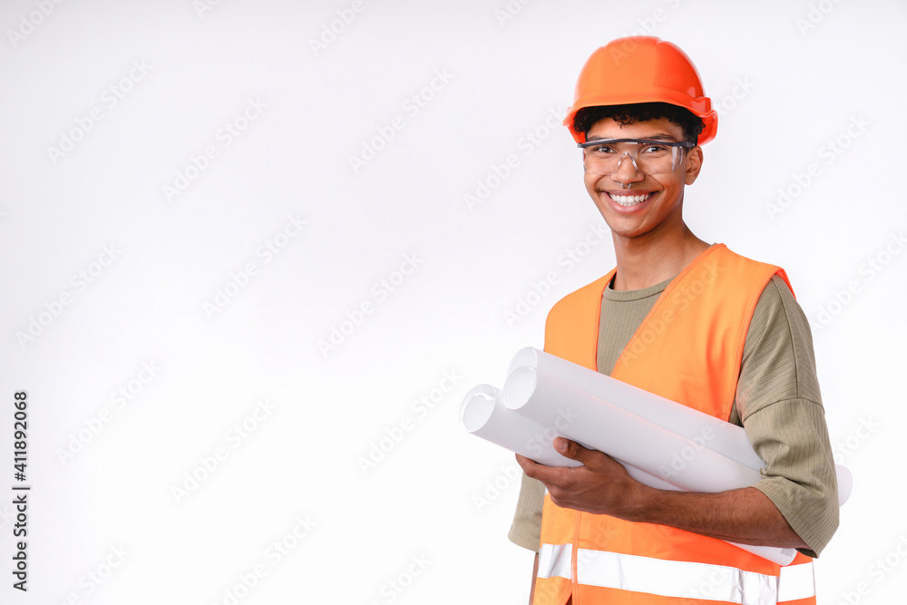 Handsome young mixed-race architect holding architectural plan isolated ... Handsome young mixed-race architect holding architectural plan isolated ...