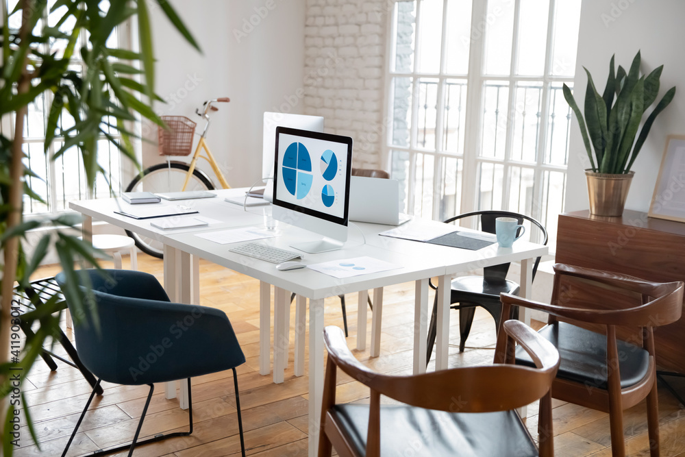 Modern loft office for small marketing team. Empty work space with ...