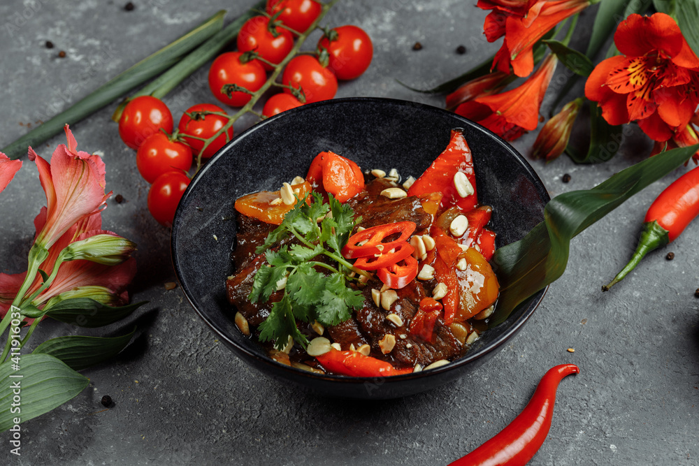 Beef wok. Traditional chinese mongolian beef stir fry in chinese cast ...