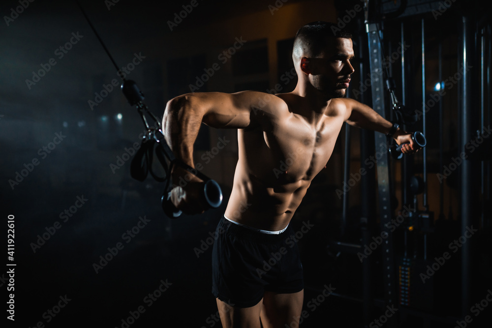 Muscular Fitness Bodybuilder Doing Heavy Weight Exercise In The Gym ...