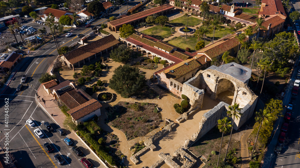 Daytime aerial view of the Spanish Colonial era mission and surrounding ...
