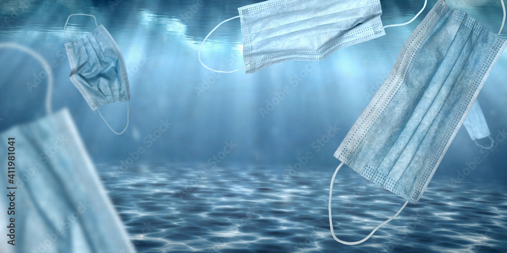 Face medical masks sinking underwater and polluting. Aquatic concept ...