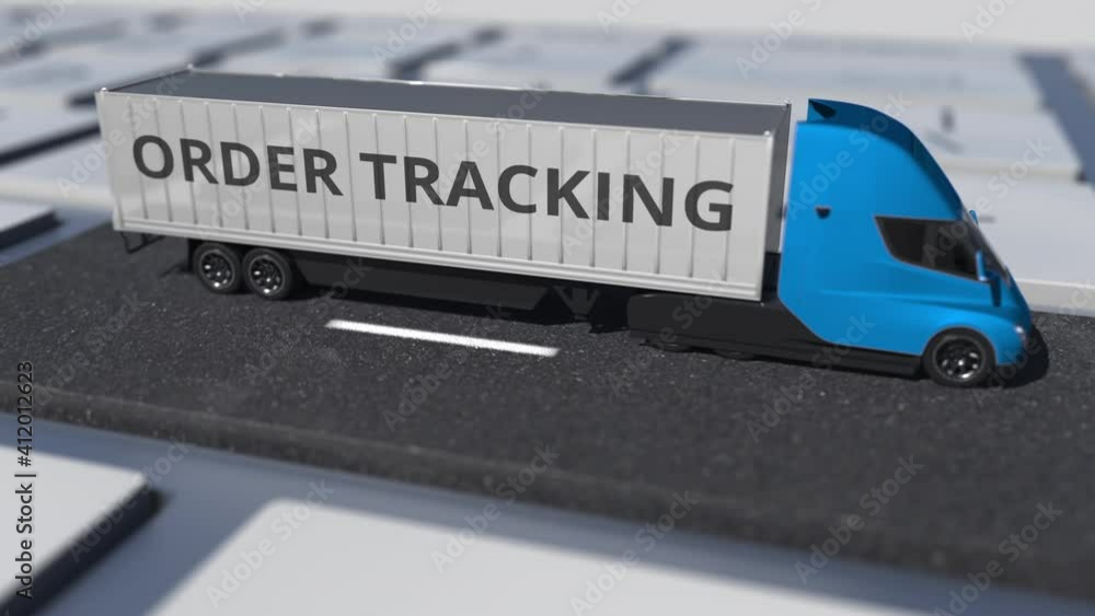 Truck with ORDER TRACKING text on the computer keyboard, conceptual ...